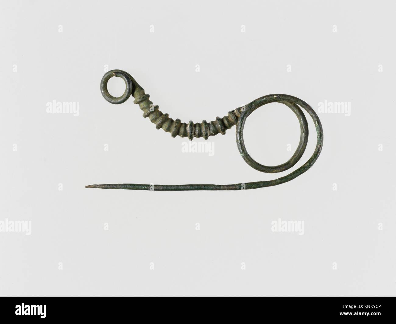 Bronze bow type fibula hi-res stock photography and images - Alamy