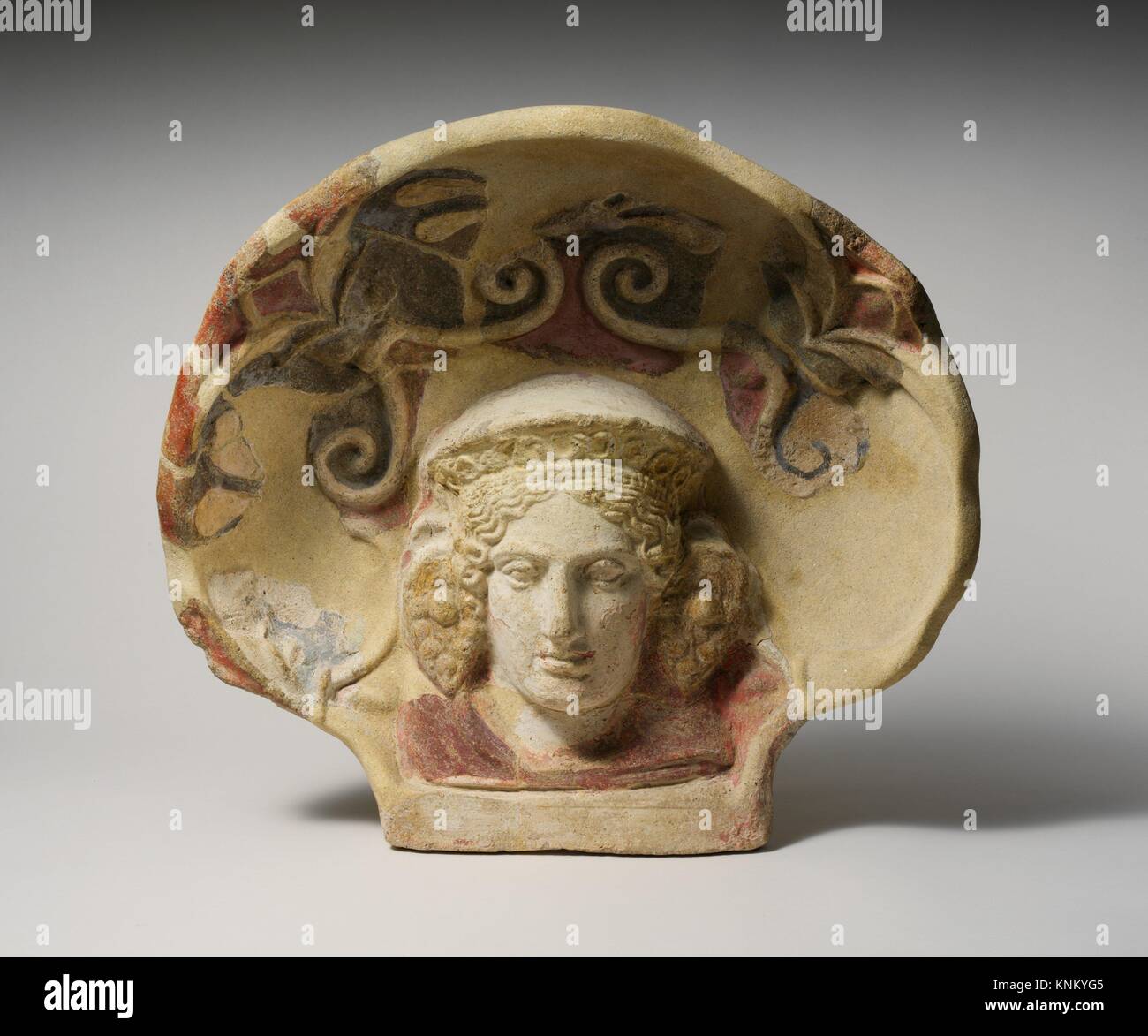 Terracotta antefix (roof tile) with head of a maenad. Period: Late ...
