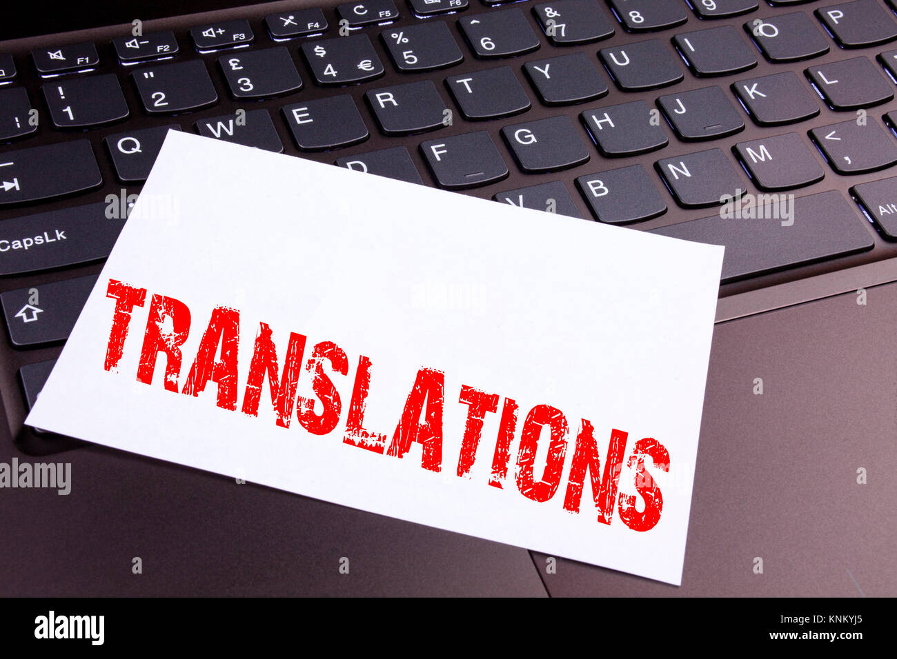 Writing Translations text made in the office close-up on laptop ...