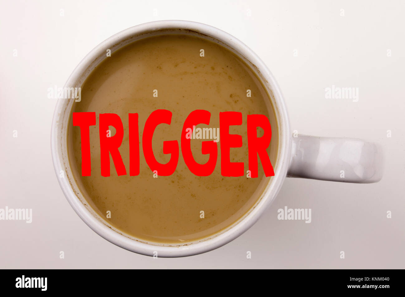 Word, writing Trigger text in coffee in cup. Business concept for Stir ...
