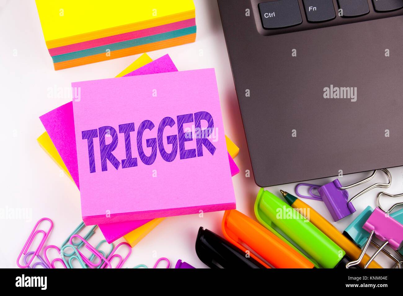 Writing text showing Trigger made in the office with surroundings such ...