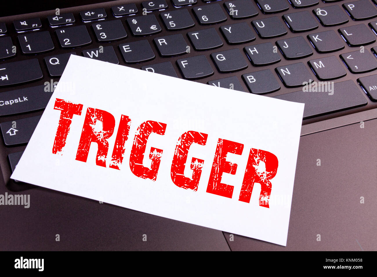 Writing Trigger text made in the office close-up on laptop computer ...