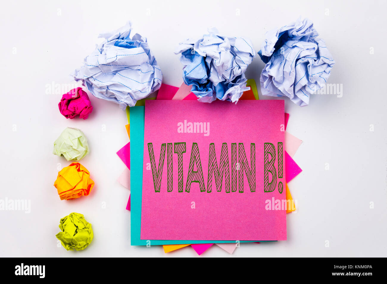 Writing text showing Vitamin B written on sticky note in office with ...