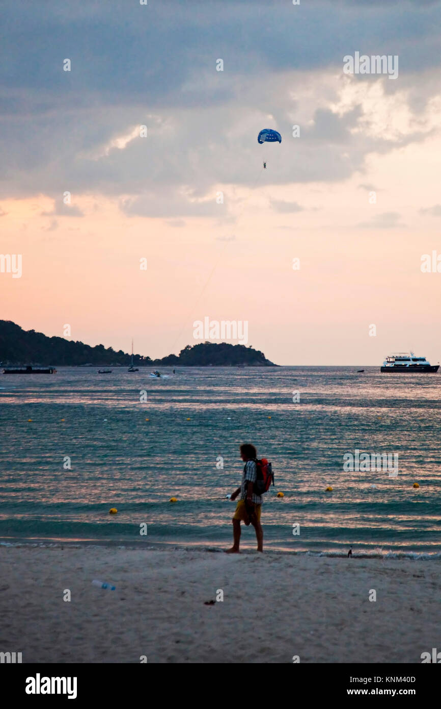 Lone tourist on Patong Beach, Phuket, Thailand Stock Photo - Alamy