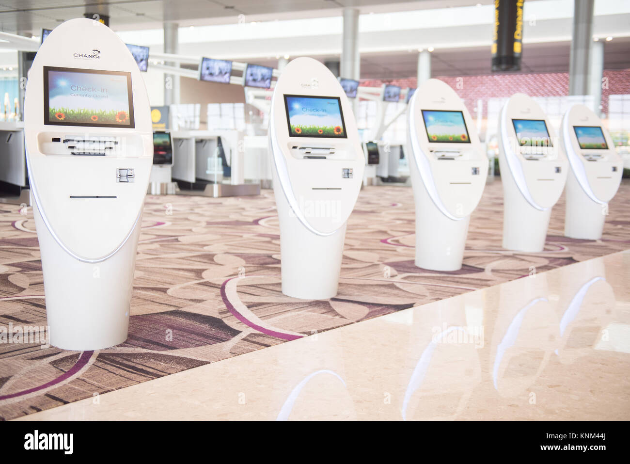 Self serving check in counter at Singapore Changi Airport Terminal 4 ...