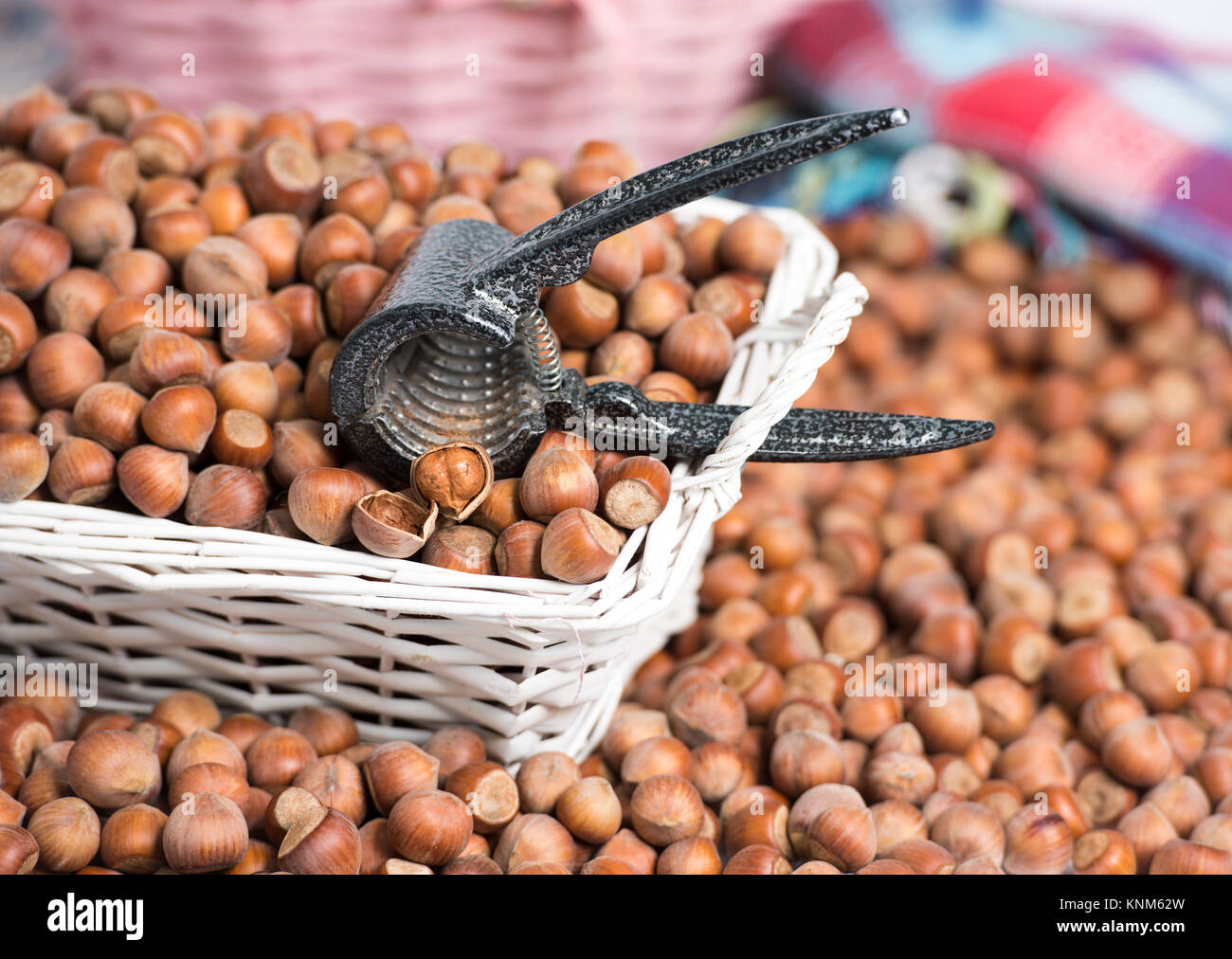 Raw hazelnuts and nutcracker Stock Photo - Alamy