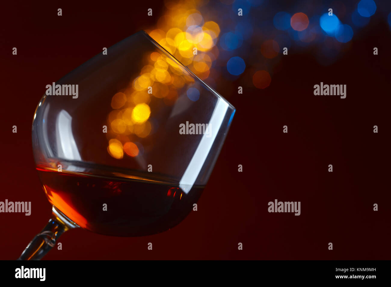 Snifter of brandy on a dark background Stock Photo - Alamy