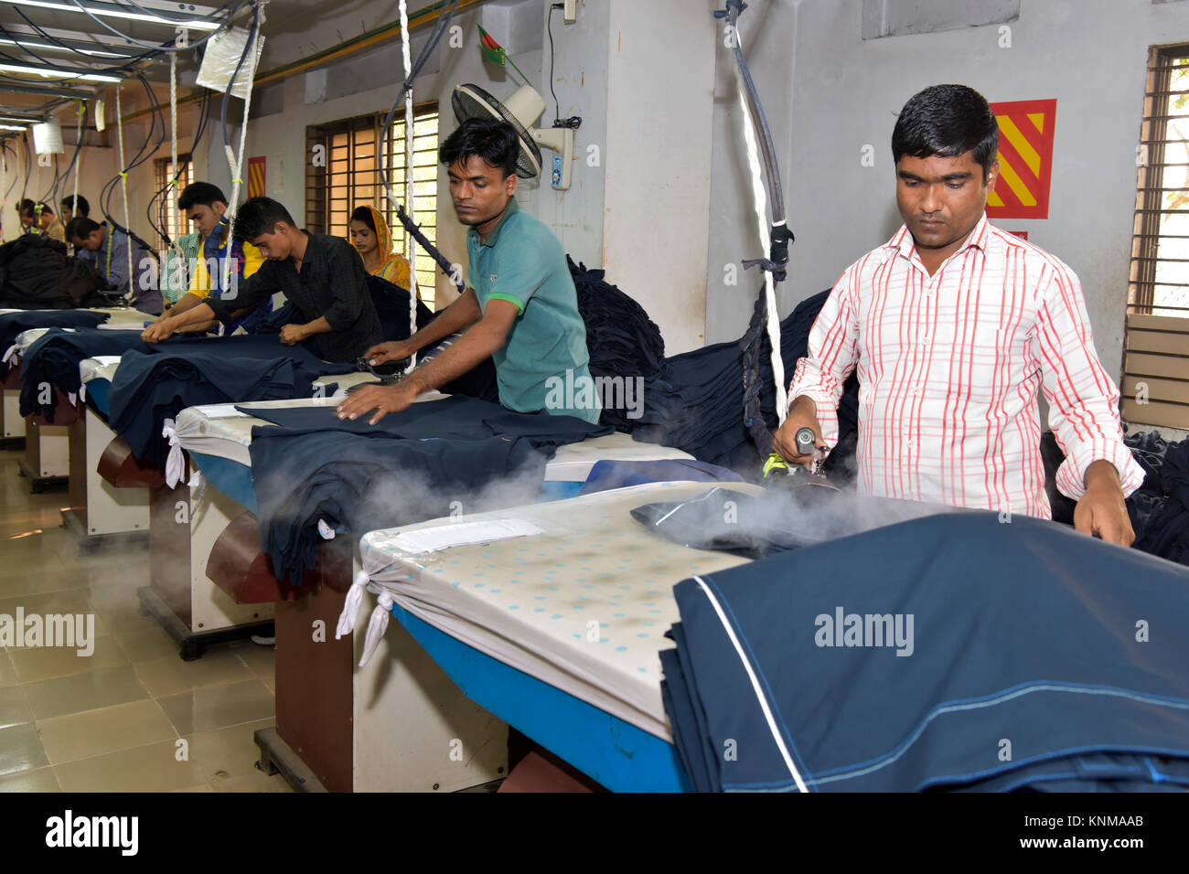DHAKA, BANGLADESH - DECEMBER 26, 2016: Bangladeshi garments workers ...