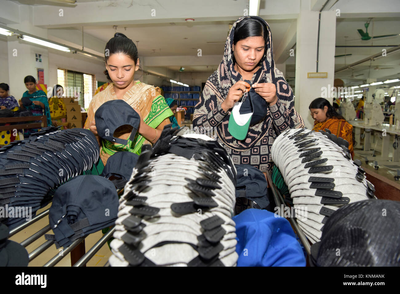 DHAKA, BANGLADESH - DECEMBER 26, 2016: Bangladeshi garments workers ...