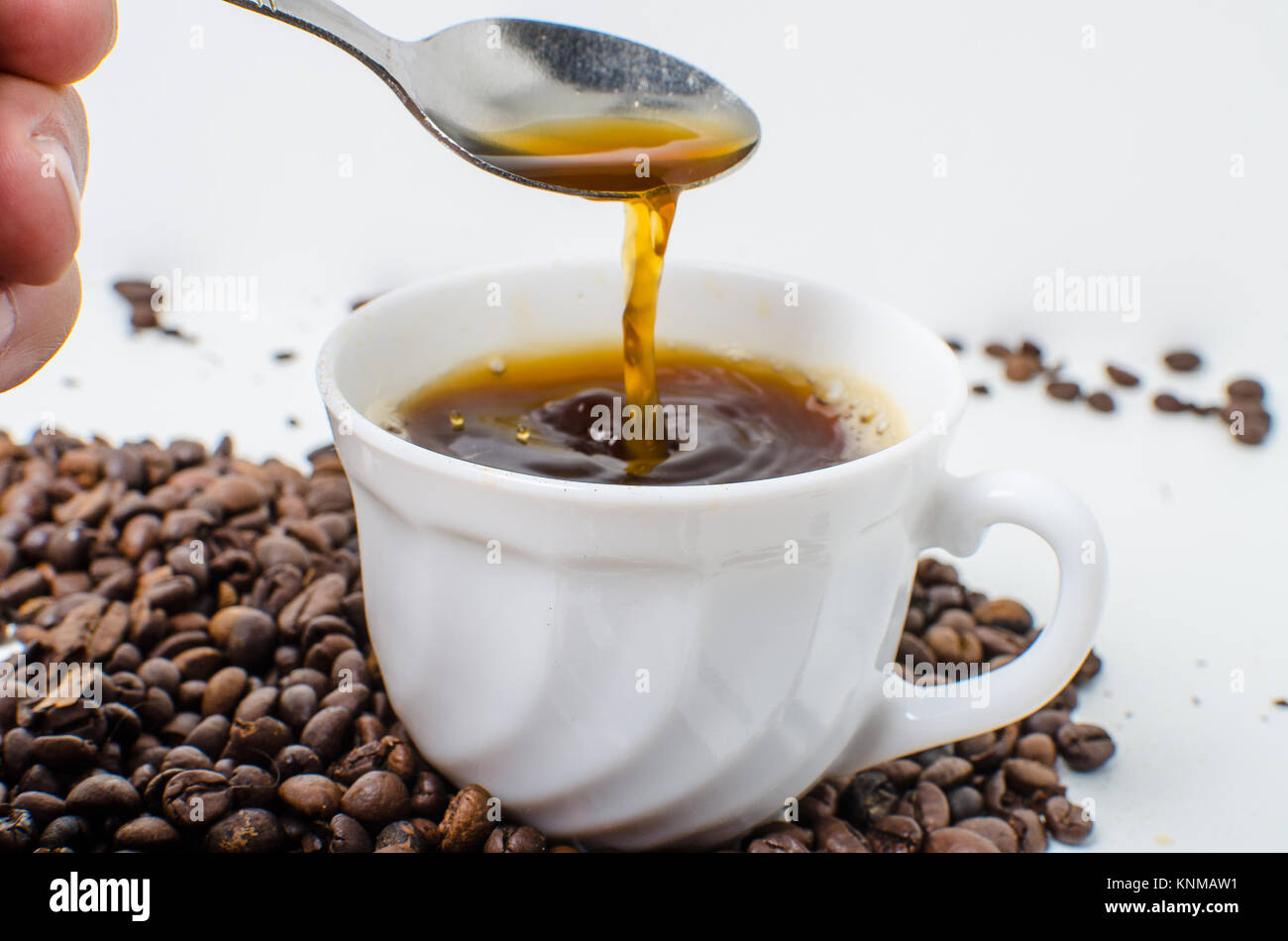 A cup of hot coffee for lifts and warmth Stock Photo - Alamy
