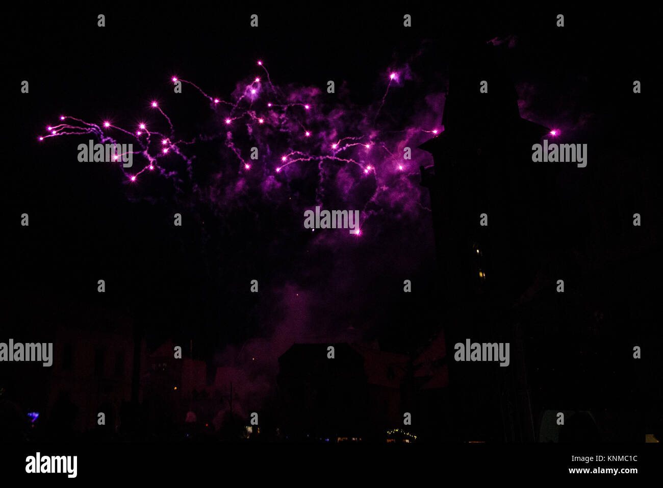 Colorful fireworks in the clouds and the beginning of Christmas time ...