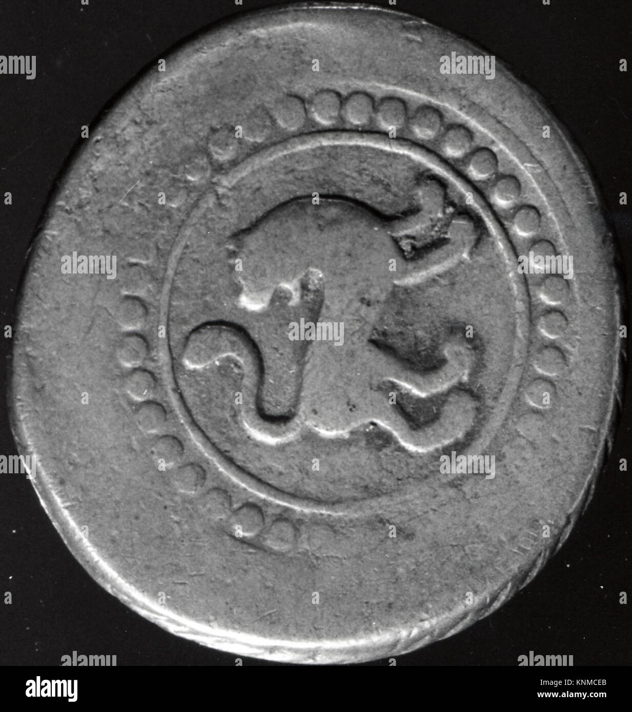 Copper coin from India, dated 1233 AH/1817 CE, illustrating early 19th ...