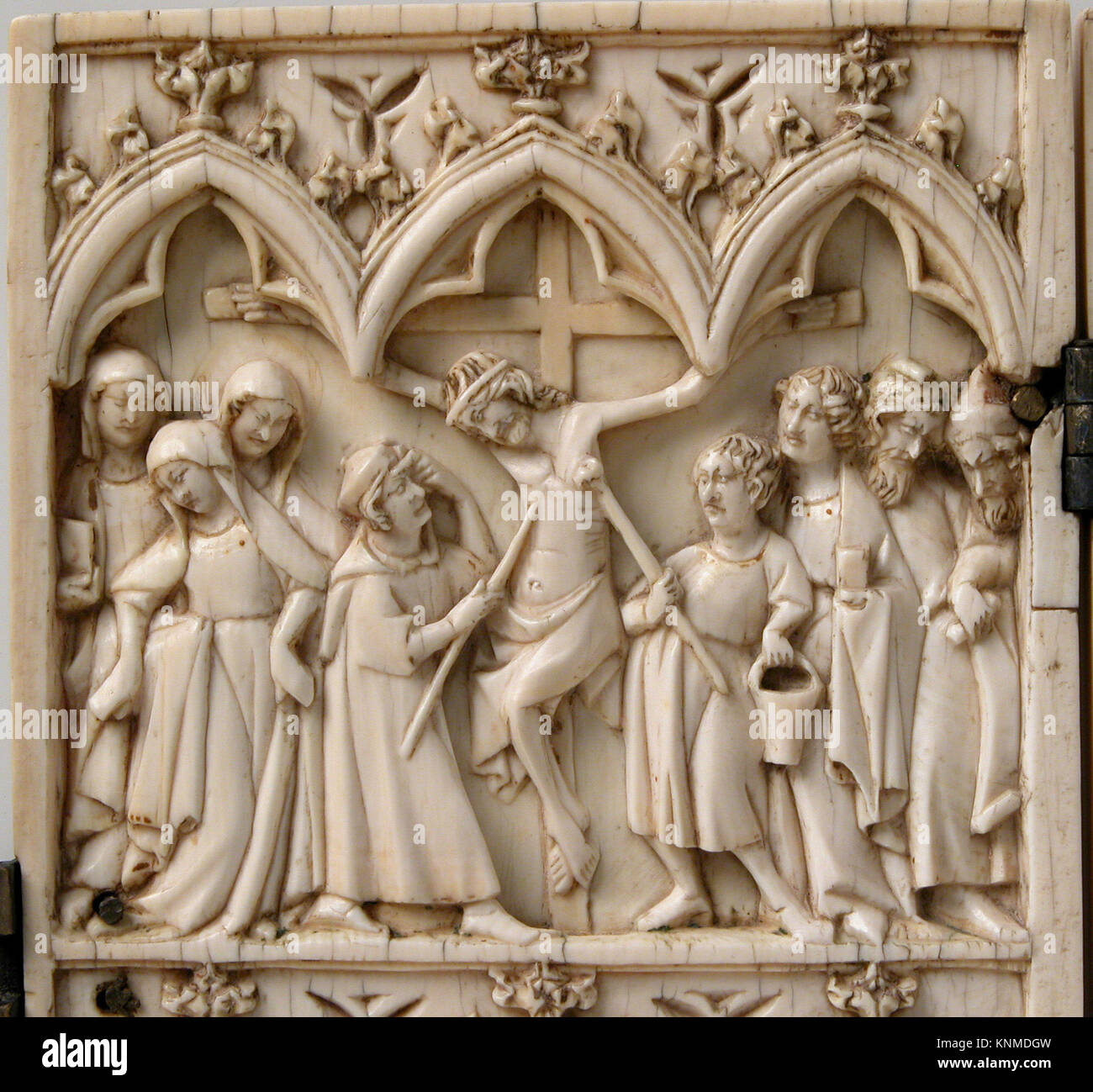 A 14th-century French diptych in ivory with metal mounts demonstrating ...