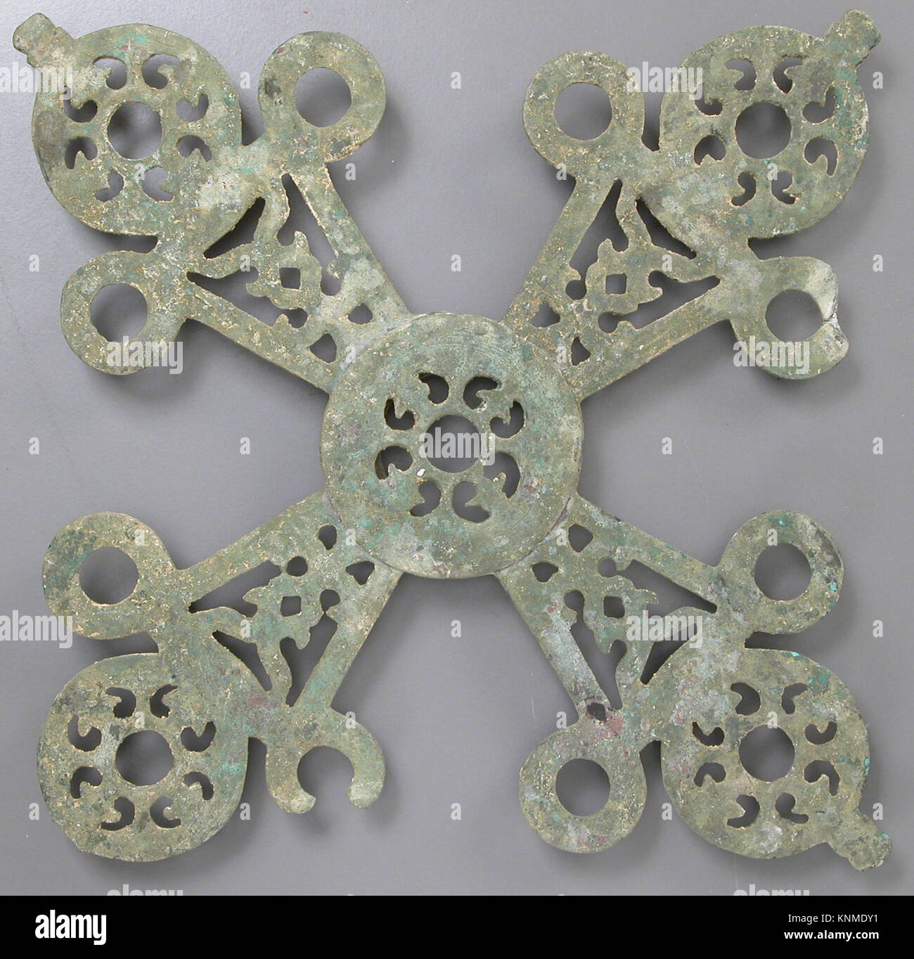 A 14th century Byzantine cross-shaped hanging lamp in copper alloy ...