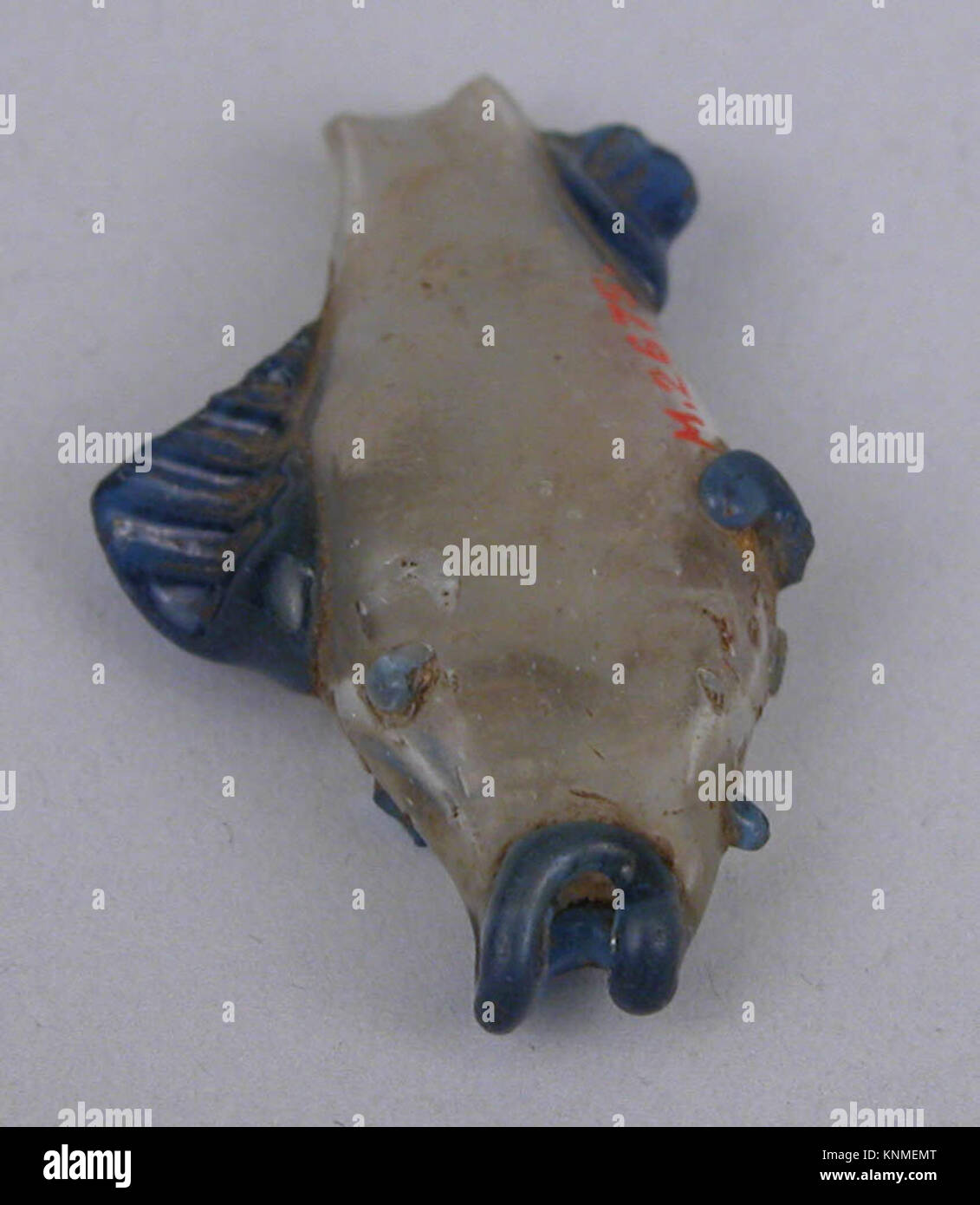 An Egyptian glass fish figurine from the 3rd–12th century, exemplifying ...