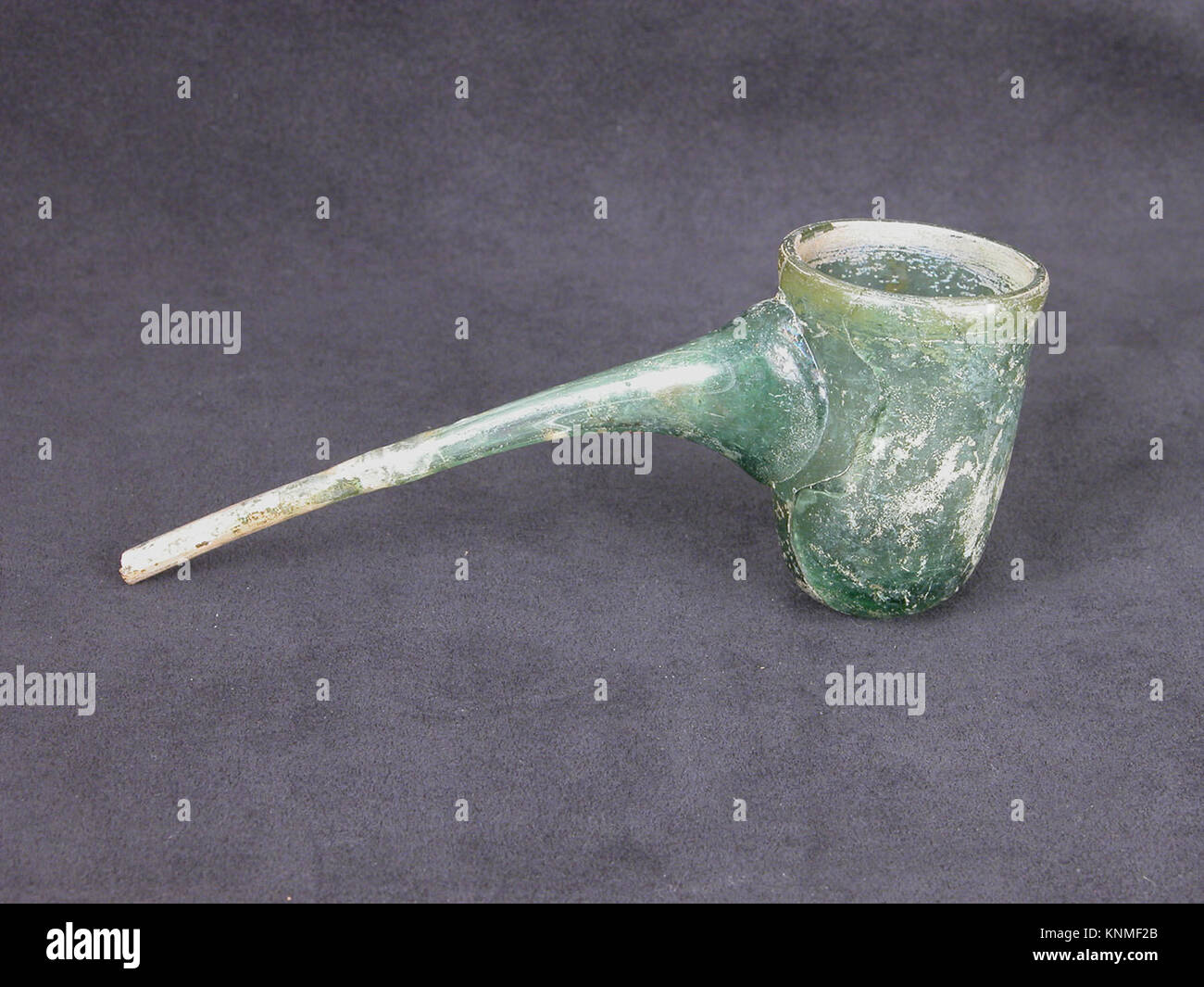 This 9th-11th century green glass alembic from Nishapur, Iran, is a ...