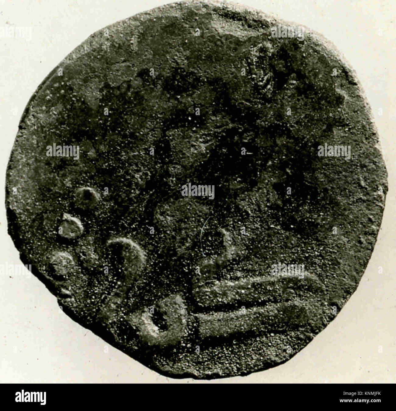 A historical coin, circular metal currency with inscriptions ...