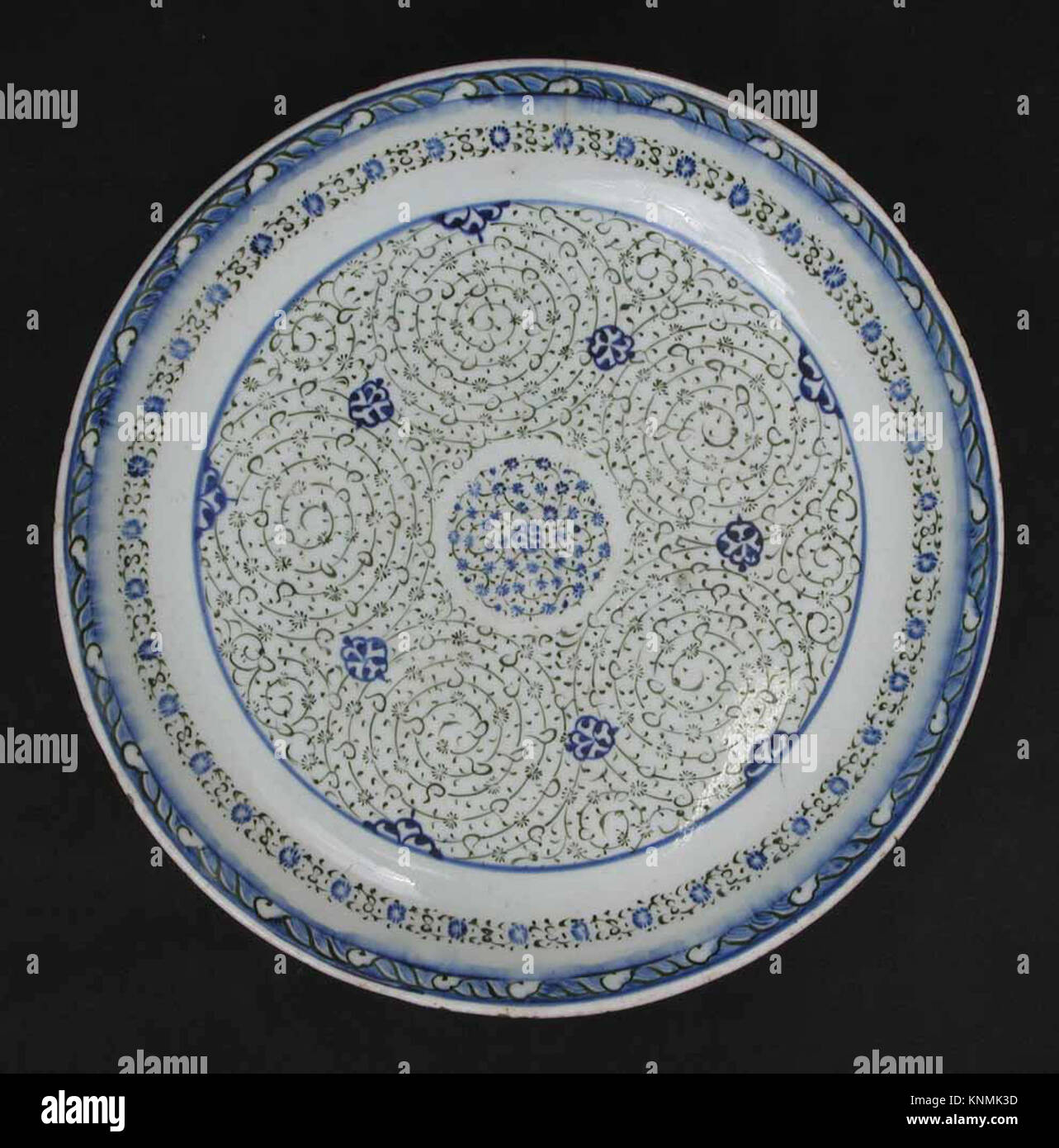 This illustration depicts a historical dish featuring a Tughra ...