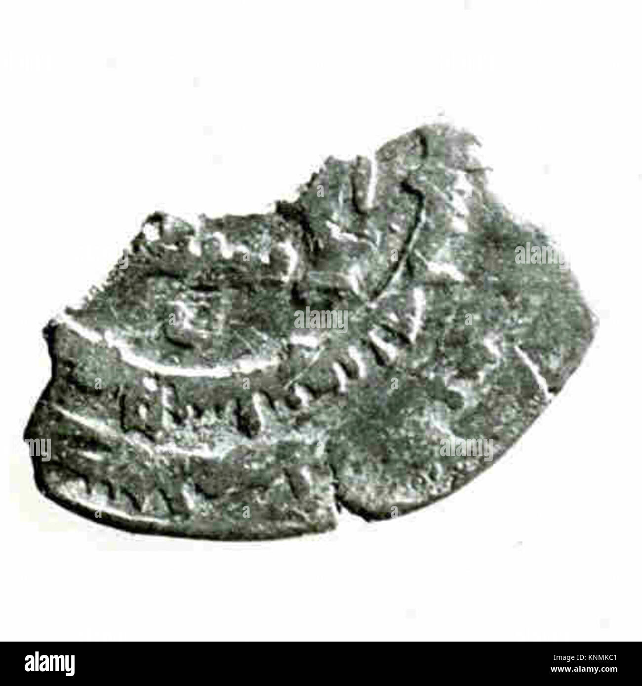 Ancient metal coin with inscriptions and imagery on obverse and reverse ...