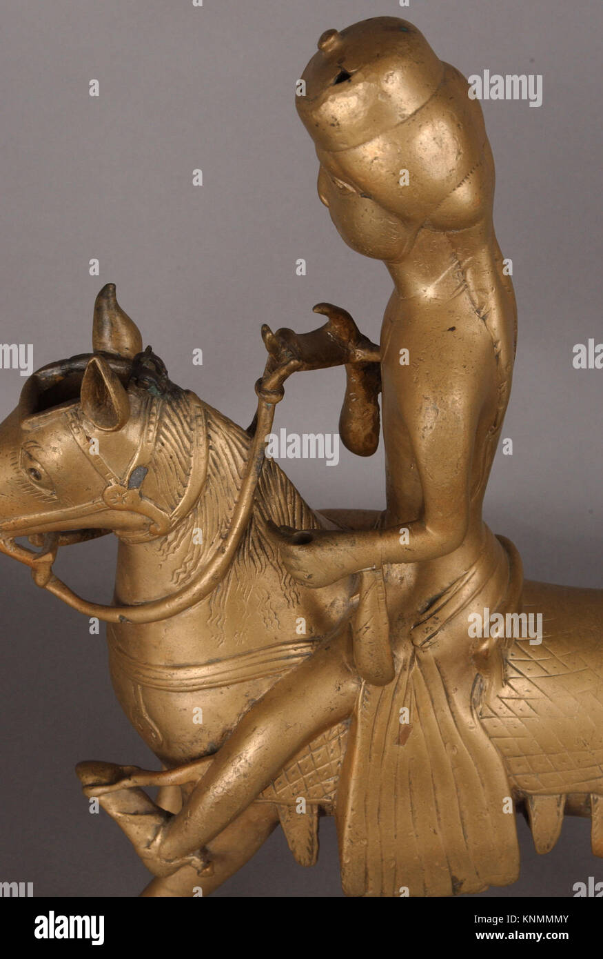 A medieval aquamanile shaped as a falconer on horseback, used as a ...