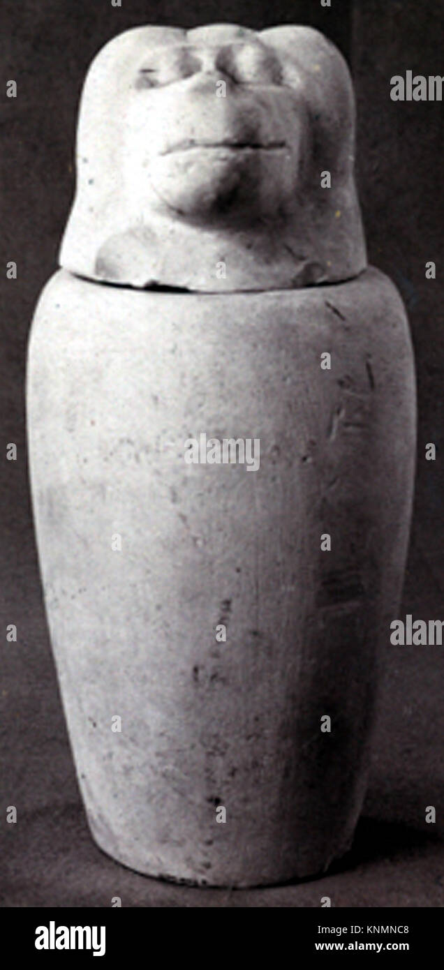 An ancient Egyptian canopic jar with a baboon-headed lid representing ...
