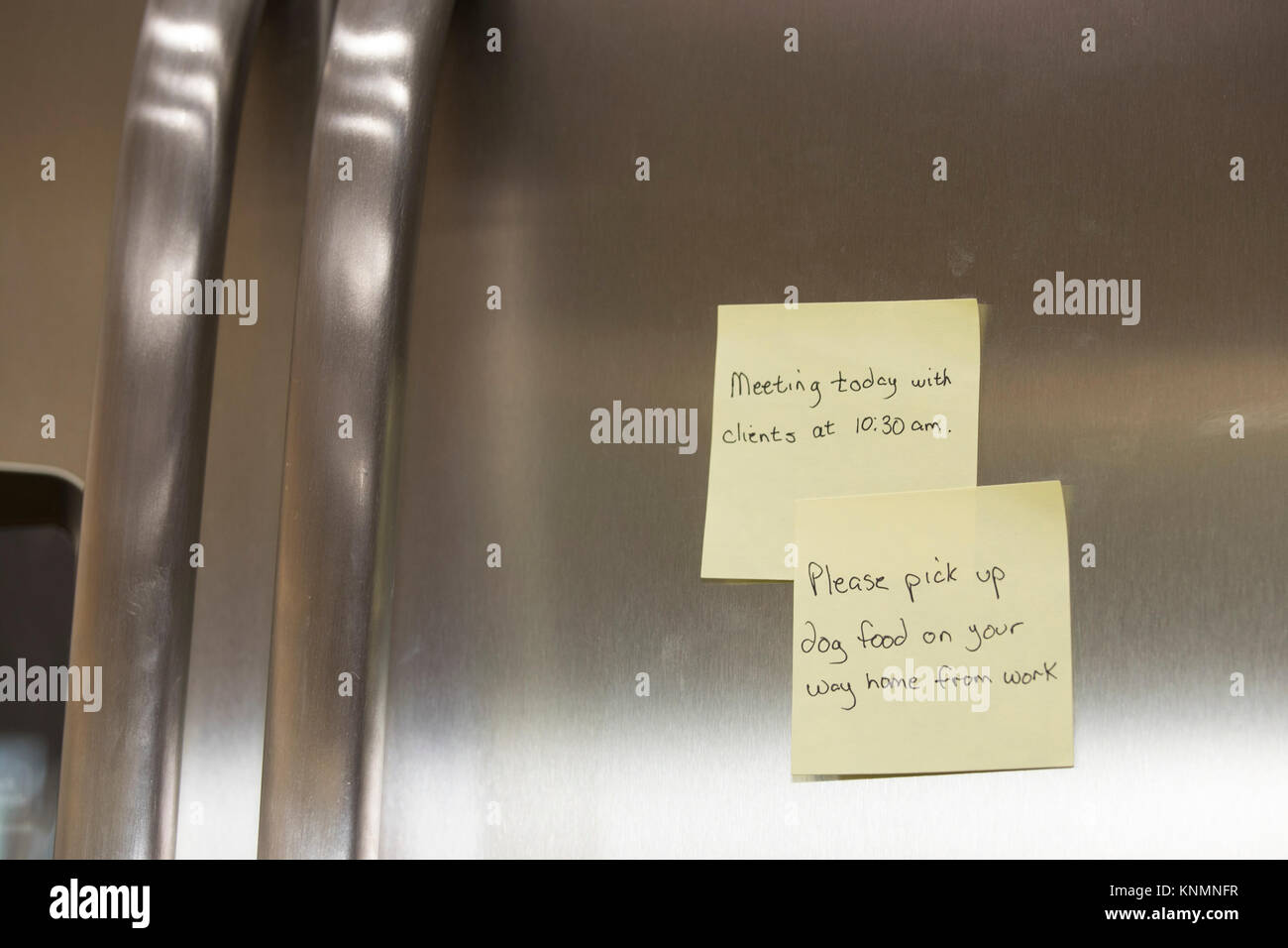 Sticky note reminders stuck on the refrigerator in the kitchen Stock ... Sticky note reminders stuck on the refrigerator in the kitchen Stock ...