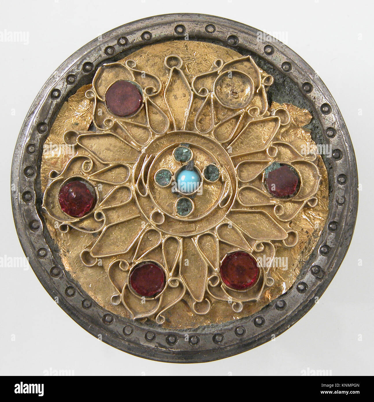 A Frankish disk brooch from the 8th century, made of silver, coated ...