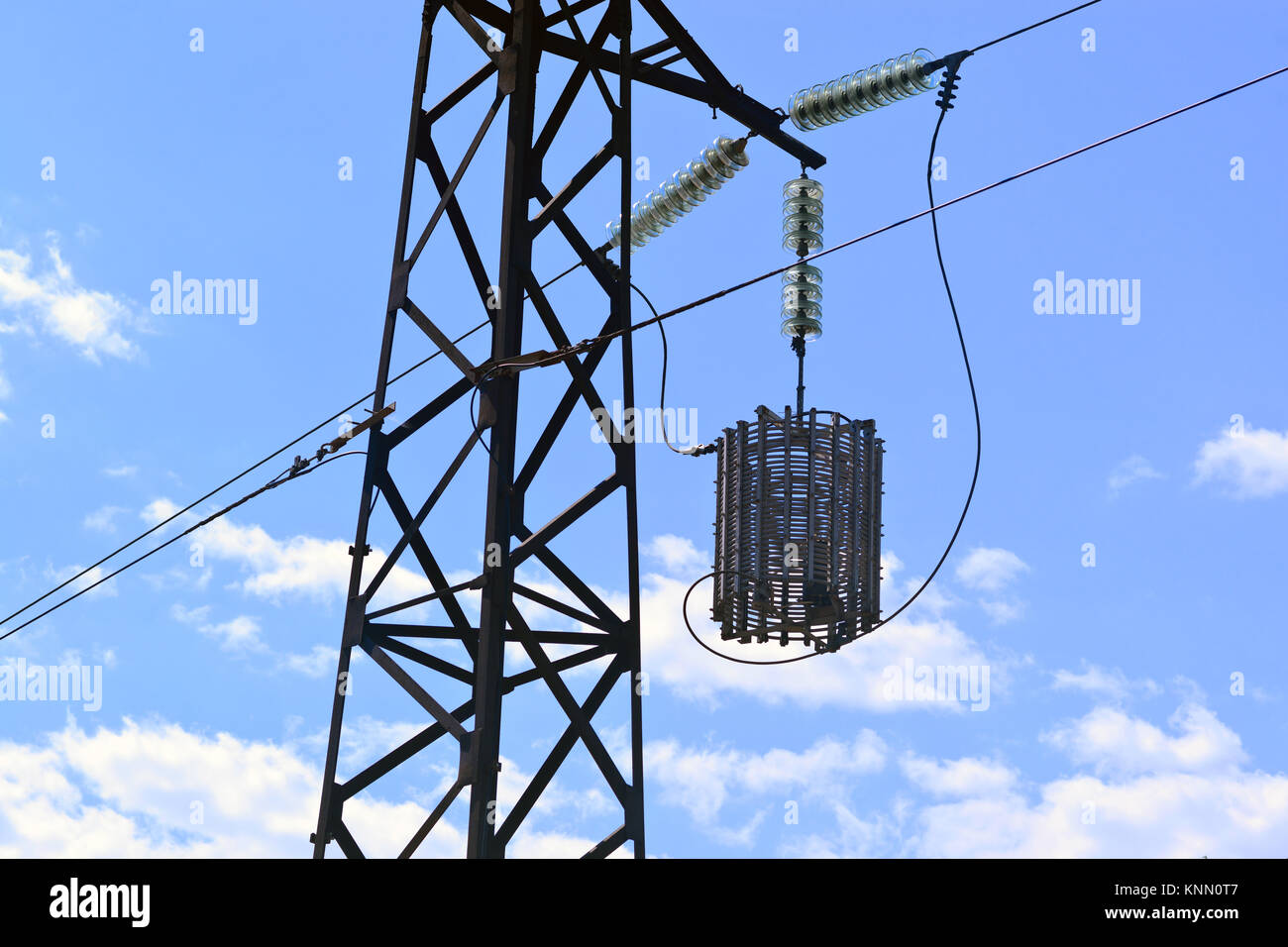 A line trap mounted inline on high-voltage AC transmission power line ...