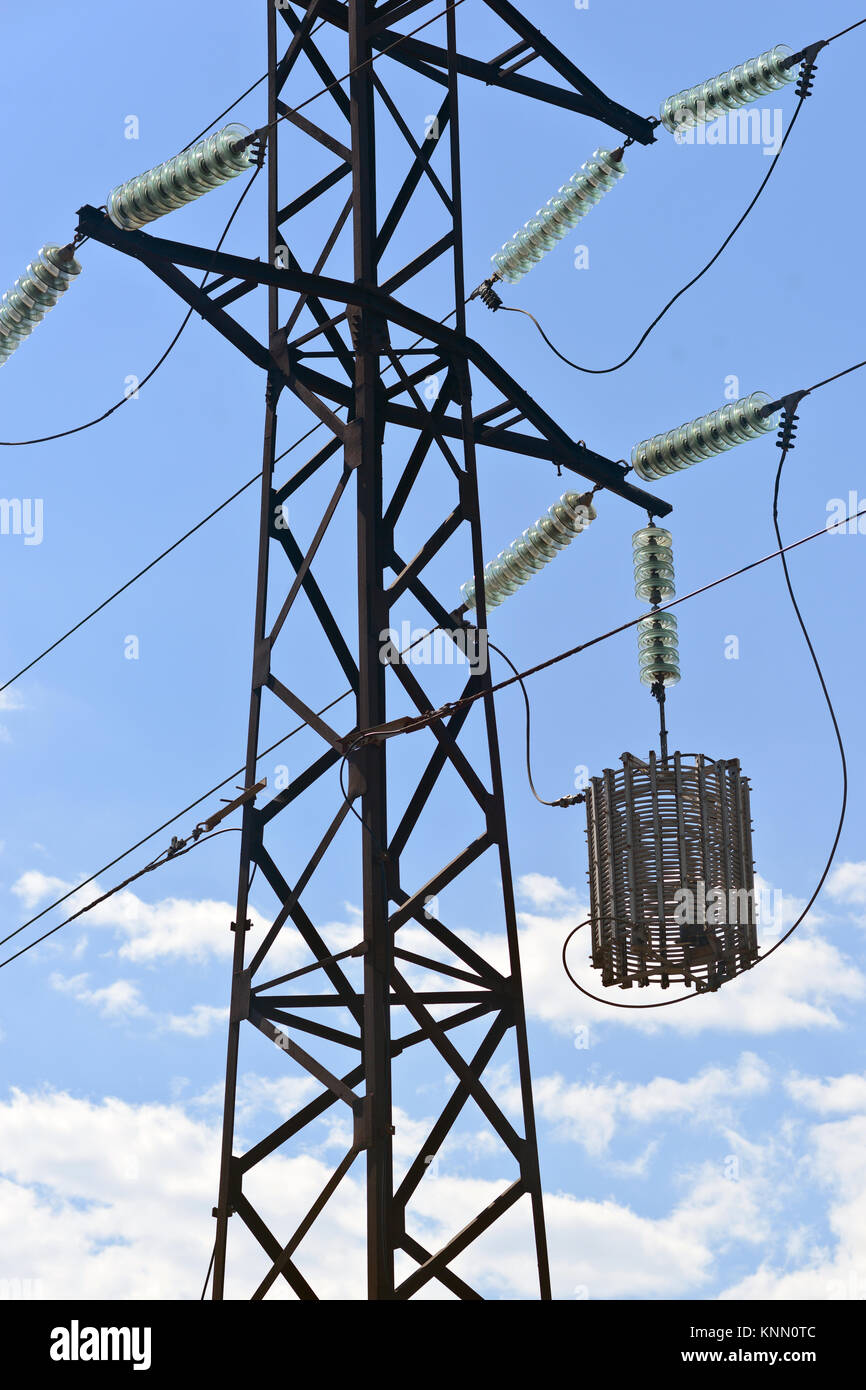 A line trap mounted inline on high-voltage AC transmission power line ...