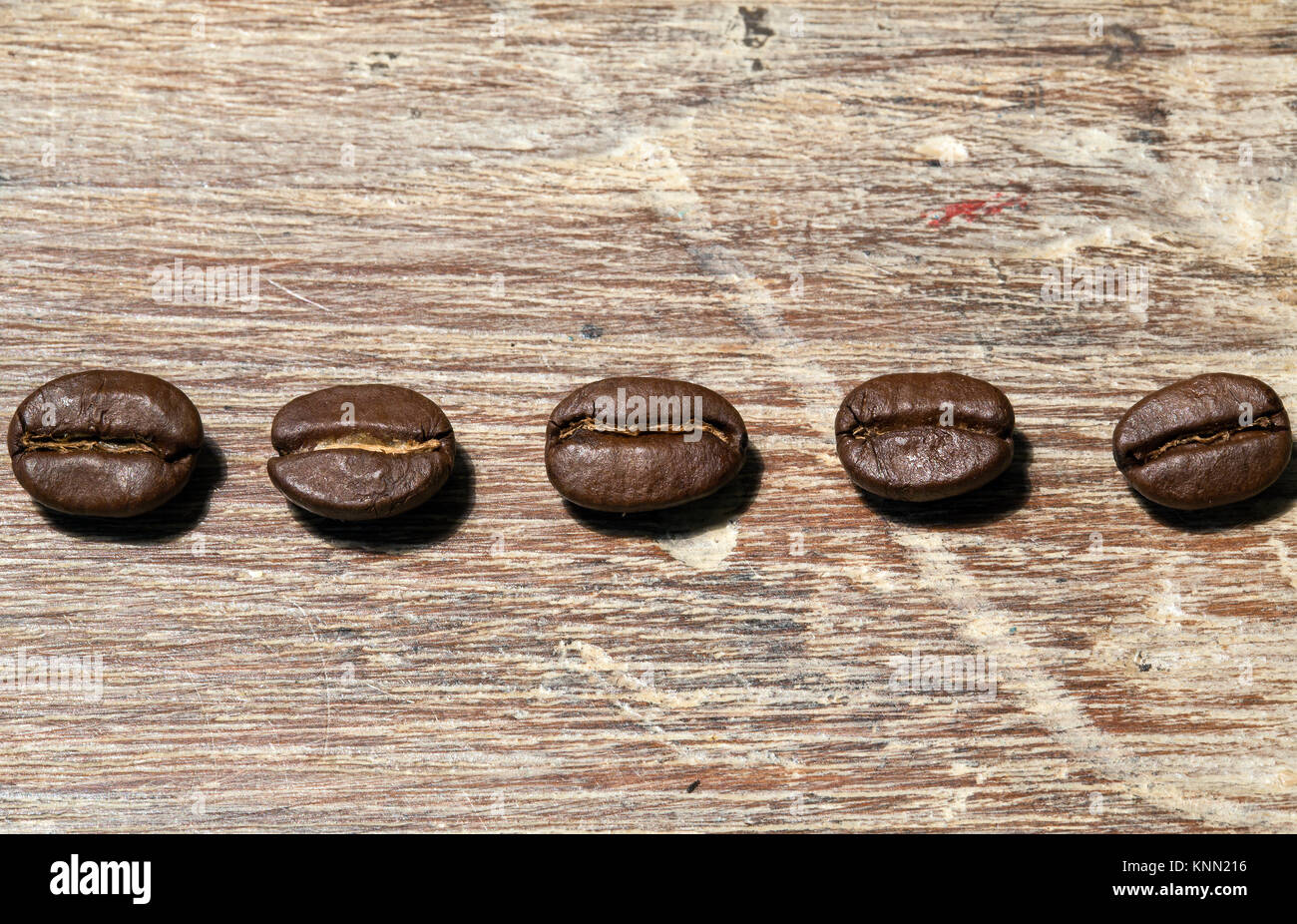 coffee beans in a row Stock Photo - Alamy
