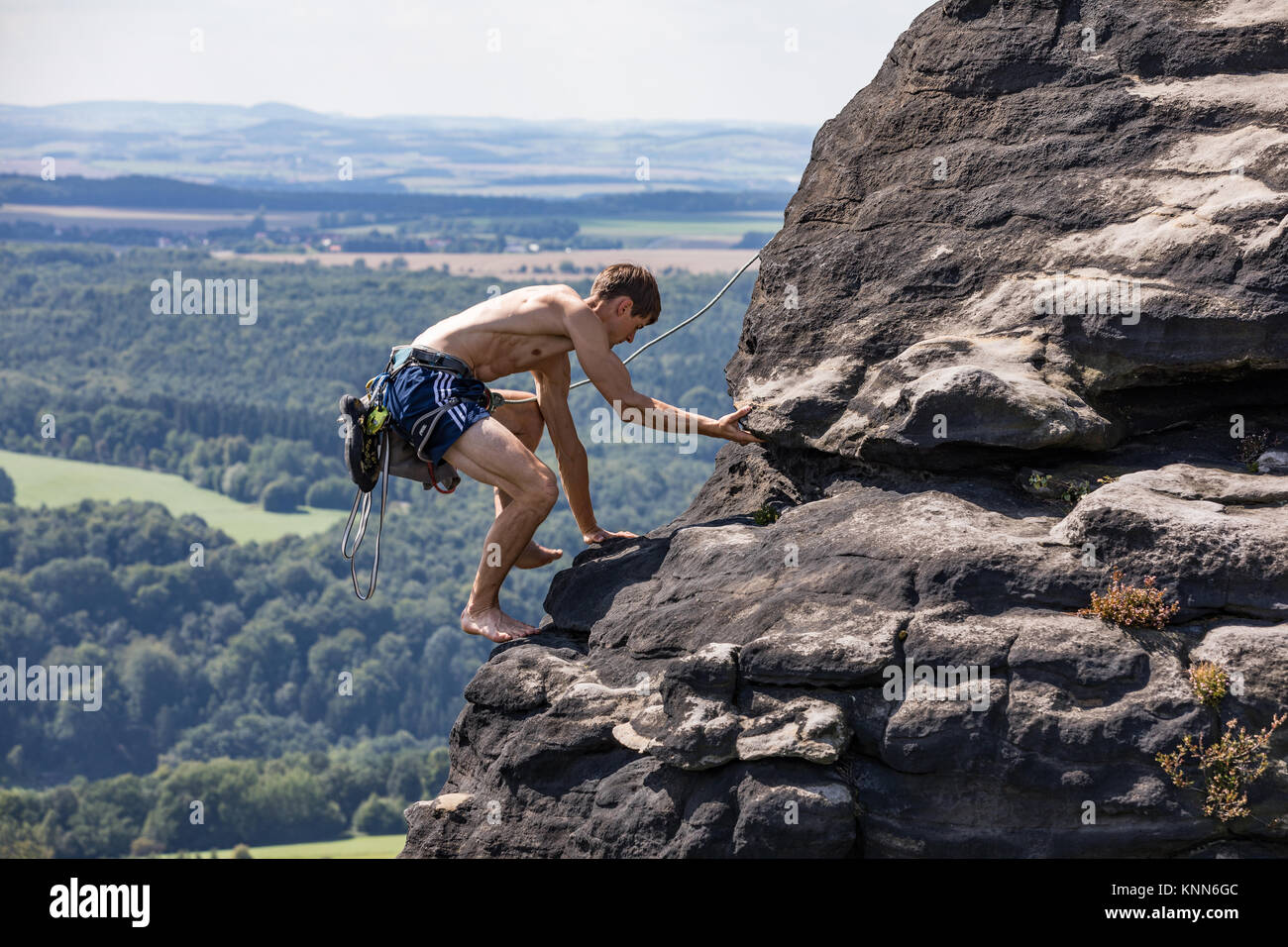 Rock climb climbing climber barefoot hi-res stock photography and ...