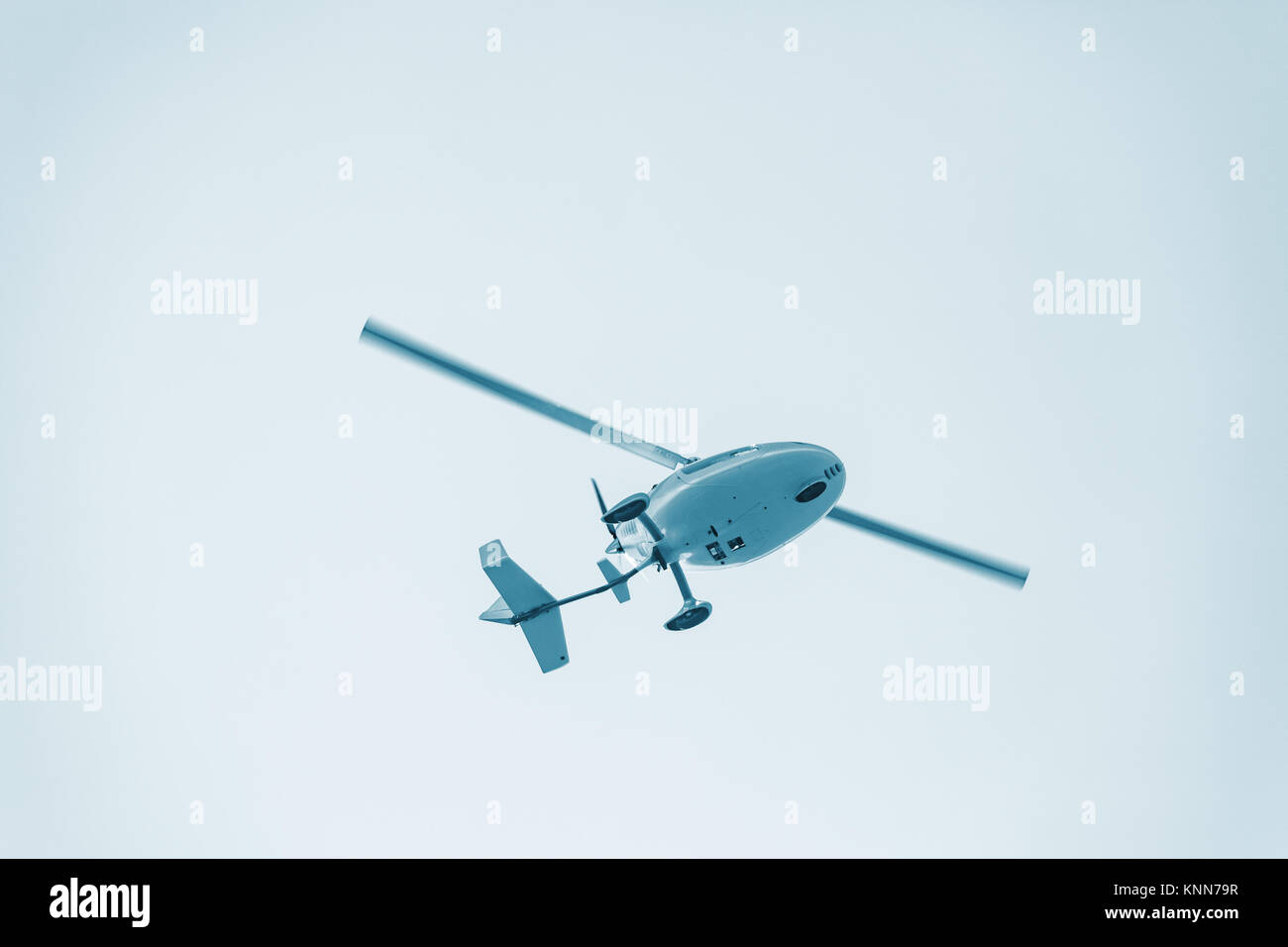 white gyroplane in sky, Ultralight gyroplane Stock Photo - Alamy