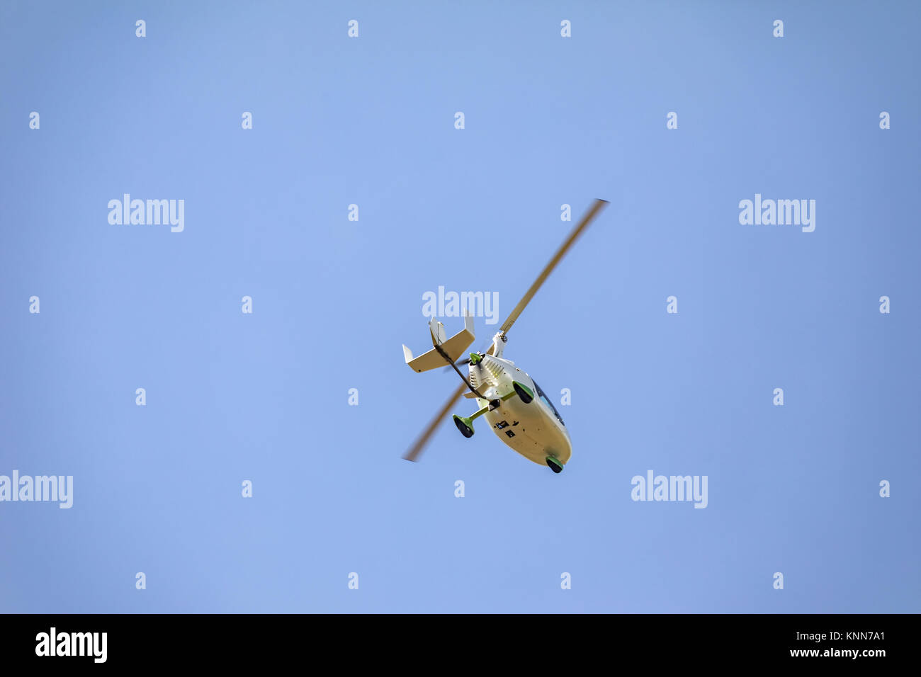white gyroplane in sky, Ultralight gyroplane Stock Photo - Alamy