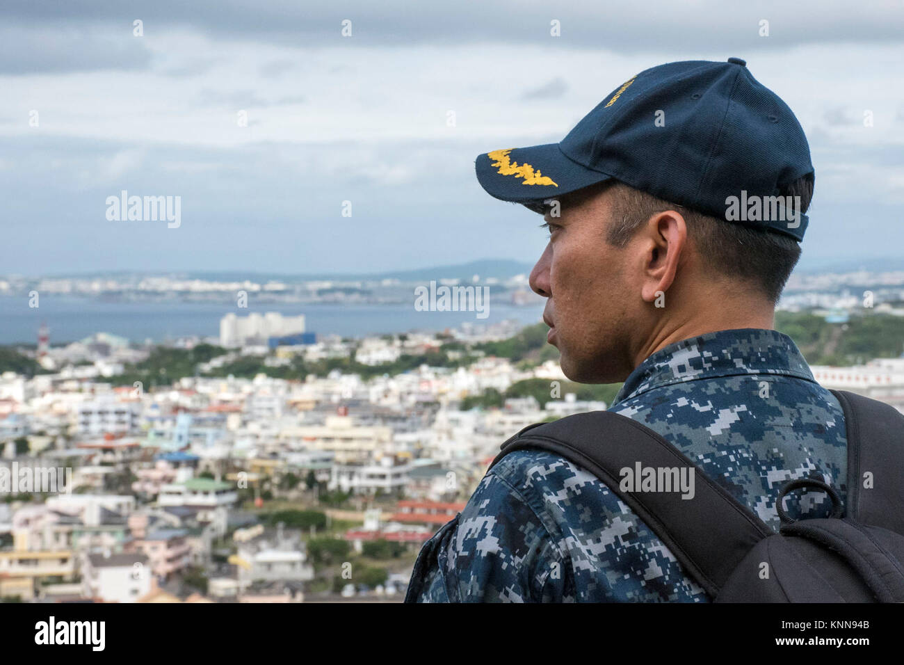 OKINAWA, Japan (Nov. 30, 2017) Cmdr. Alex Mabini observes the horizon ...