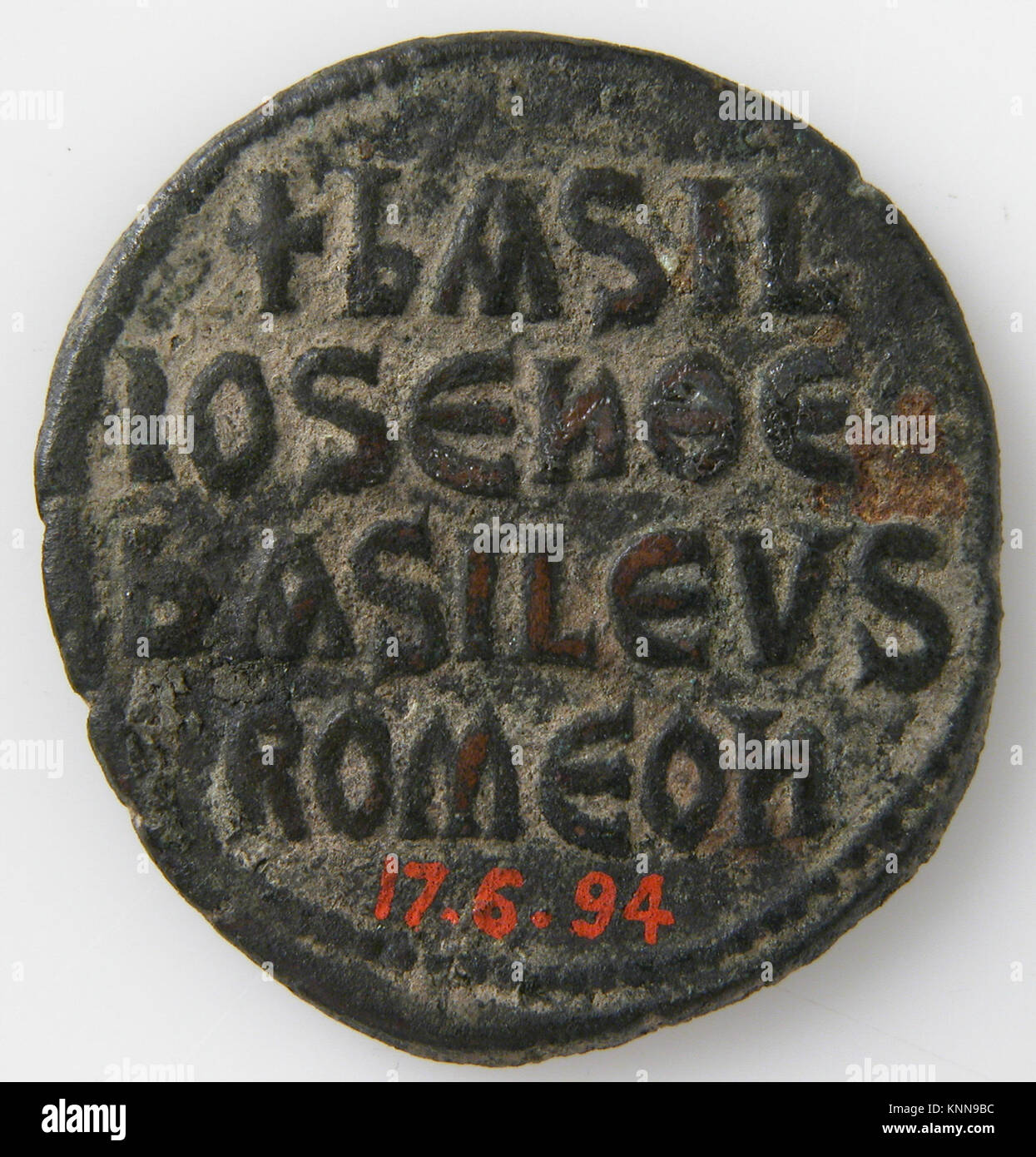 A 9th-century Byzantine coin of Emperor Basil I made of copper alloy ...