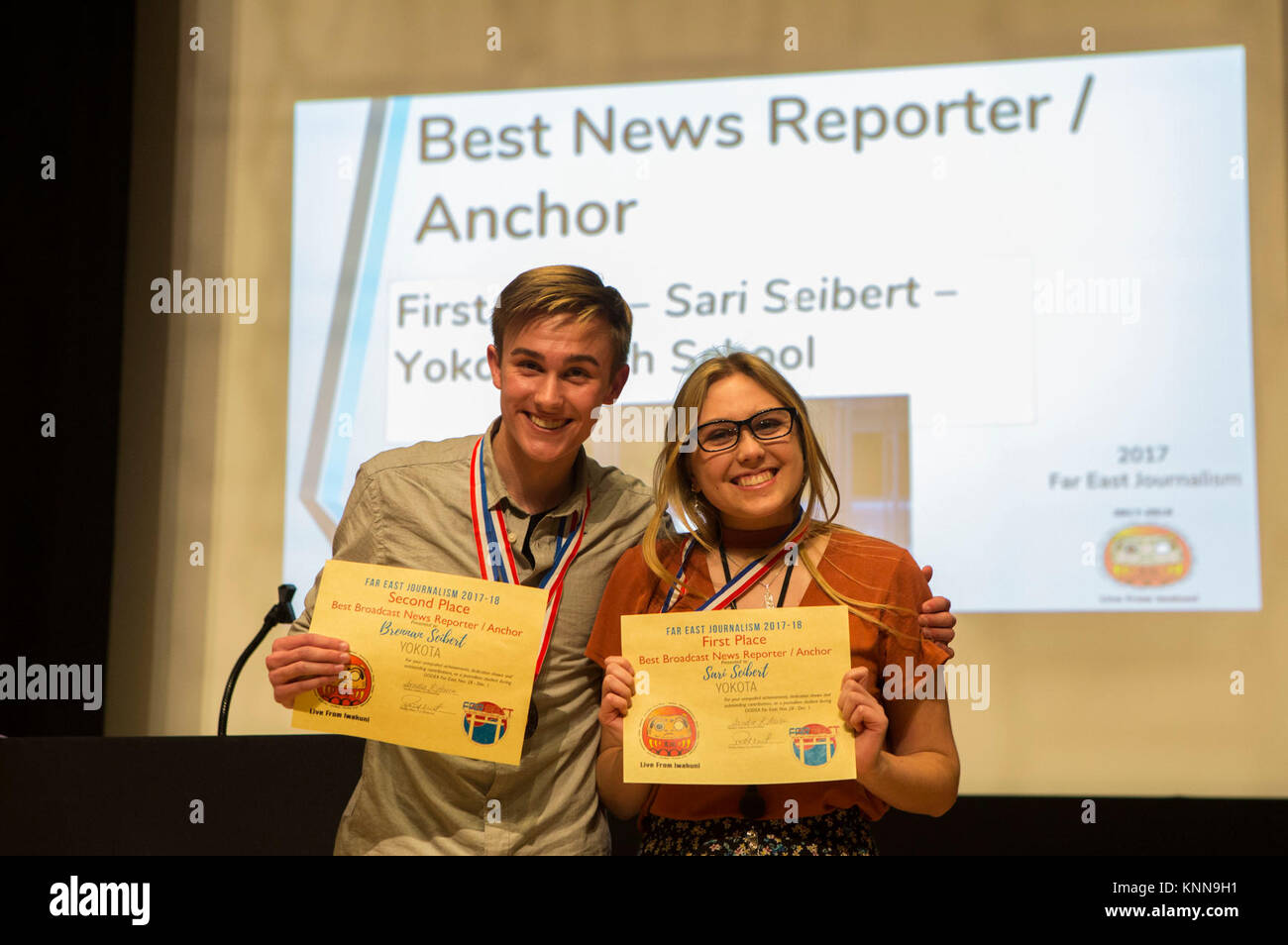 Brennan Seibert, left, a student from Yokota High School, and Sari ...