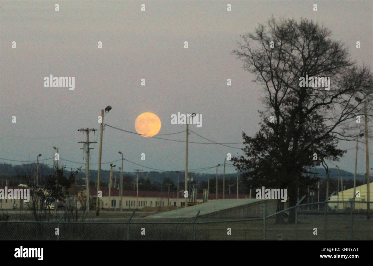 A full moon, called a "super moon" is shown rising over the cantonment ...