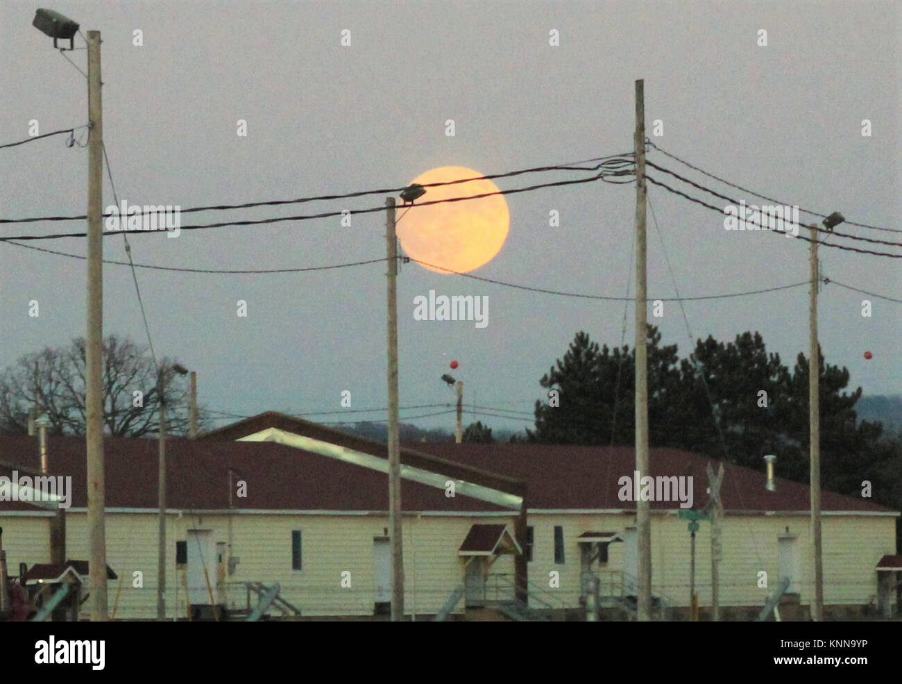 A full moon, called a "super moon" is shown rising over the cantonment ...