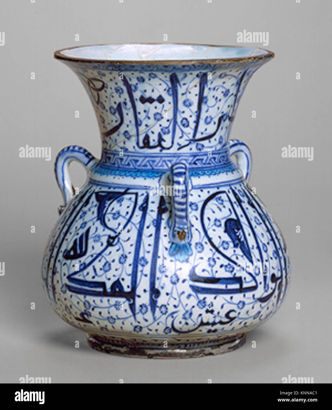 This ceramic vessel is shaped like a mosque lamp, illustrating Islamic ...