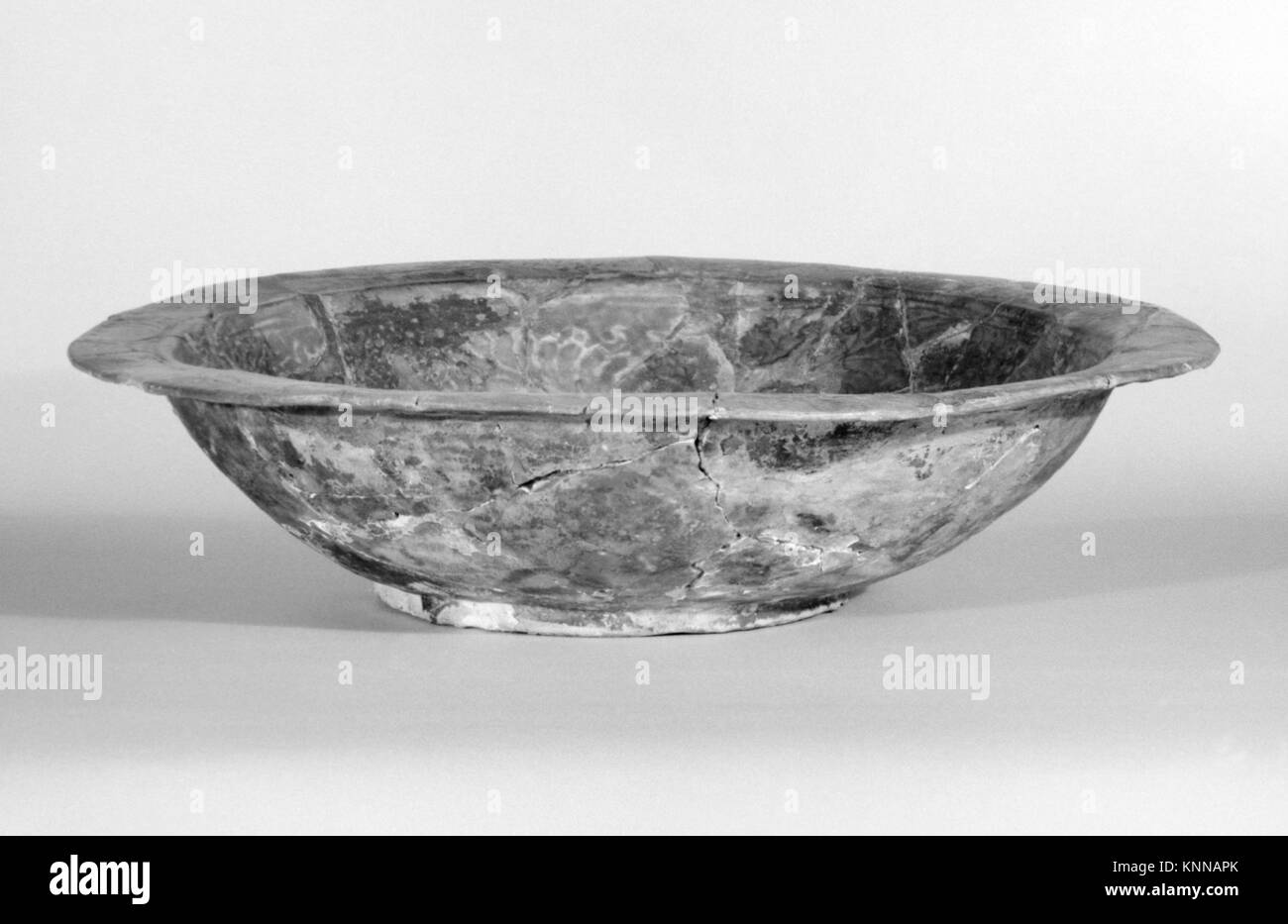 This bowl, MET 174054, is a complete ceramic vessel displaying ...