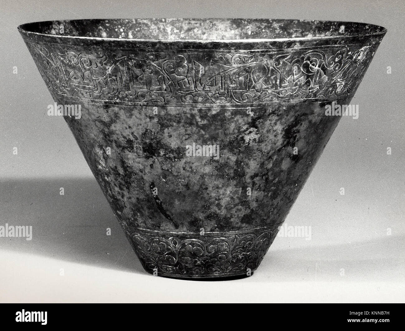 A ceramic cup from MET featuring an inscribed poem, illustrating ...