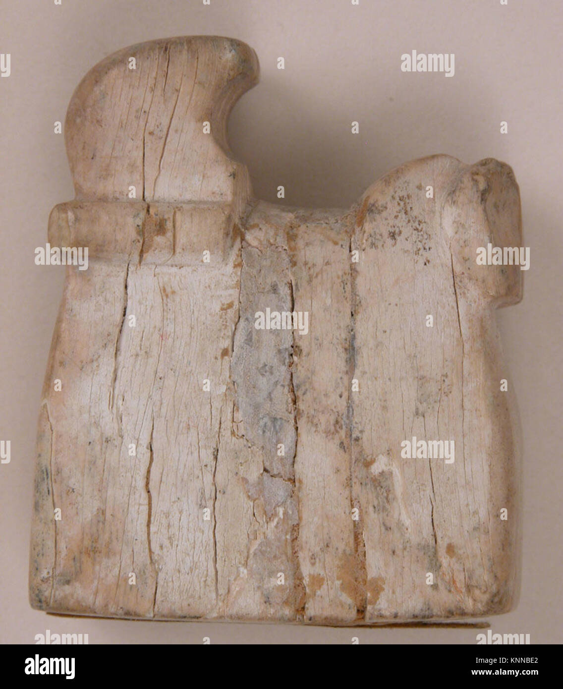 Rook chess piece carved from ivory, featuring a cylindrical form with ...