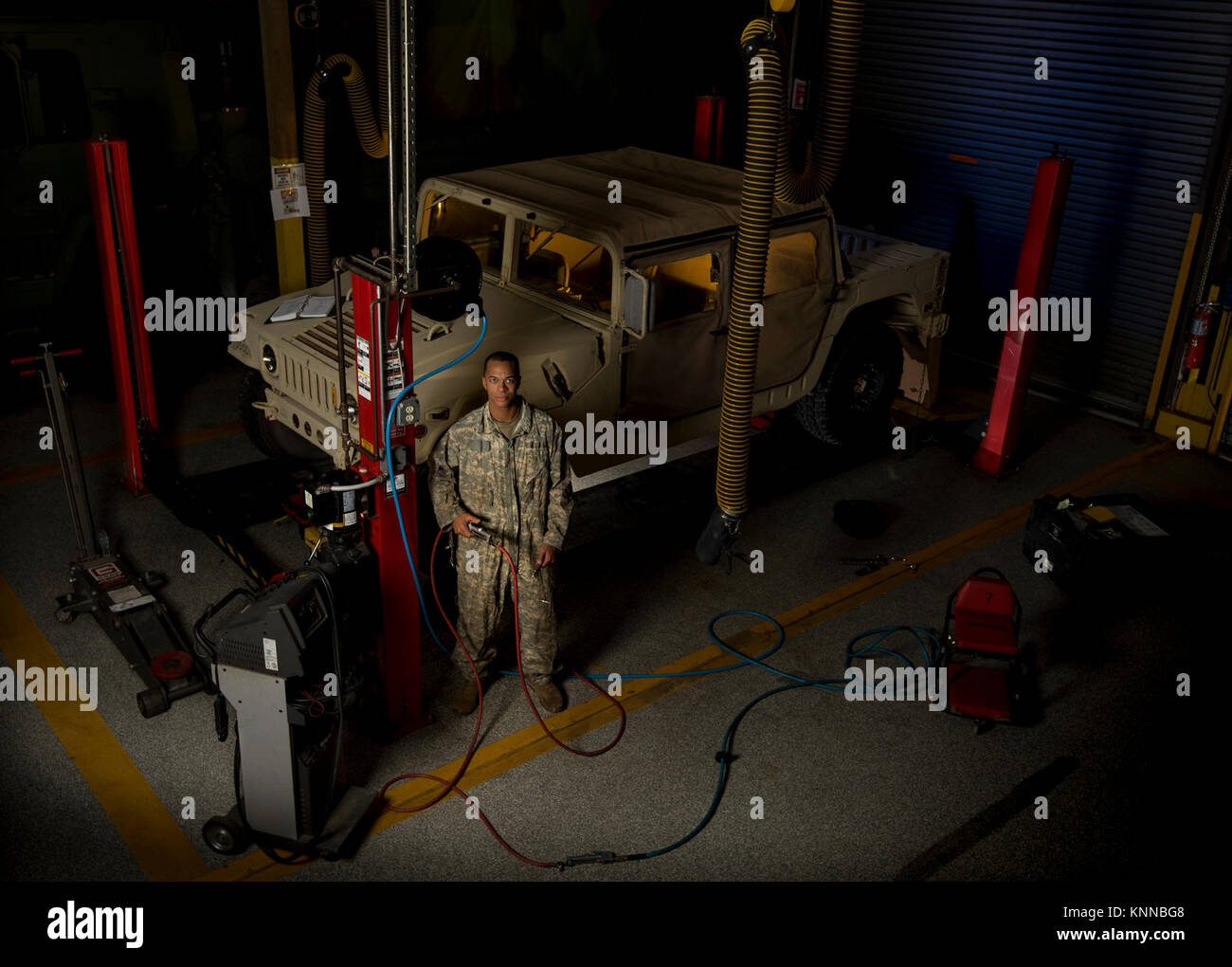U.S. Army Sgt. Samuel Nobles, a Wheeled Vehicle Mechanic assigned to ...