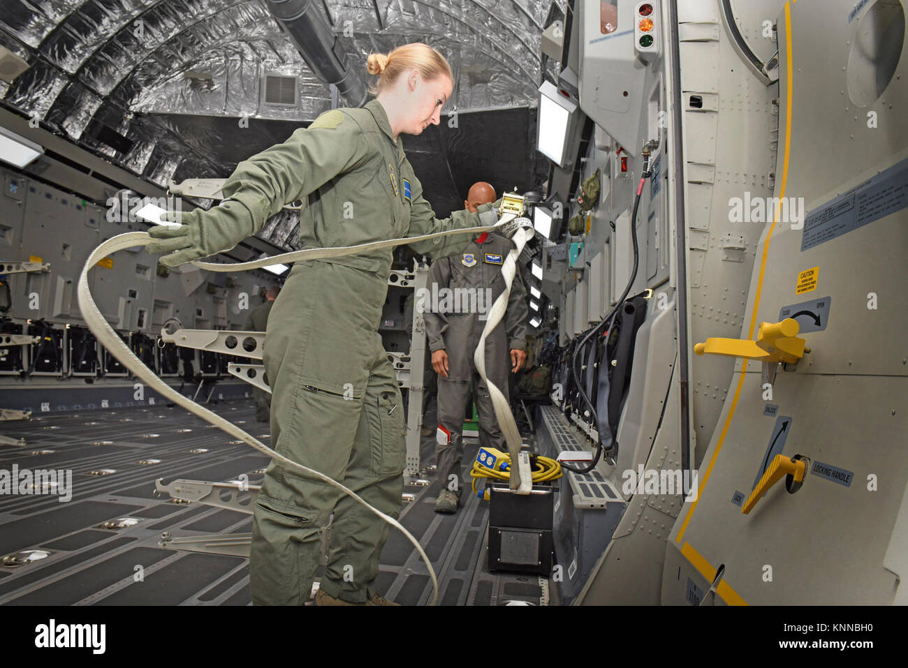 U.S Air Force Staff Sgt. Sherenda Fausnaugh, an aeromedical evacuation ...