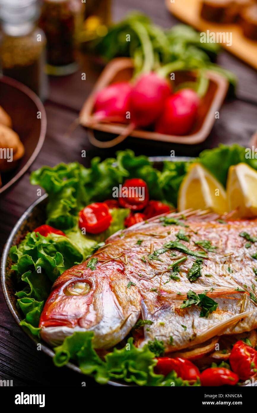 Healty and colorful grilled fish and vegetables Stock Photo - Alamy
