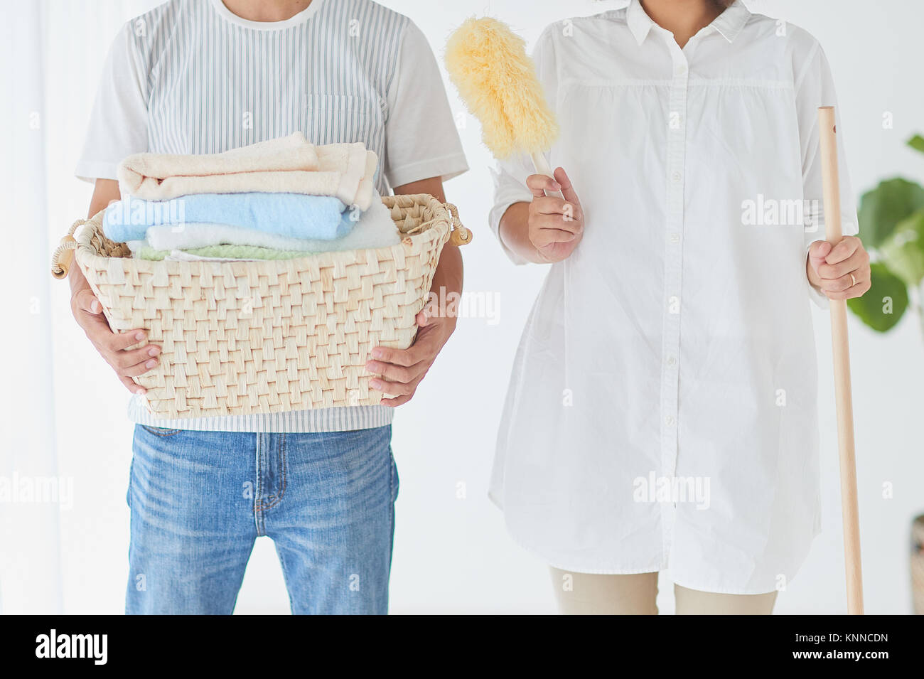 Japanese couple doing housework Stock Photo - Alamy