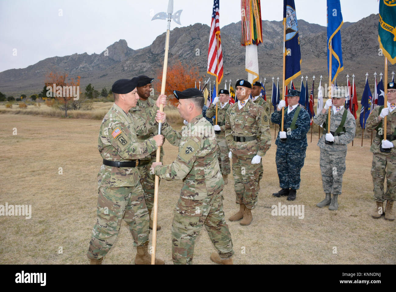Command Sgt. Maj. William K. Maddox (right) passes the Noncomissioned ...