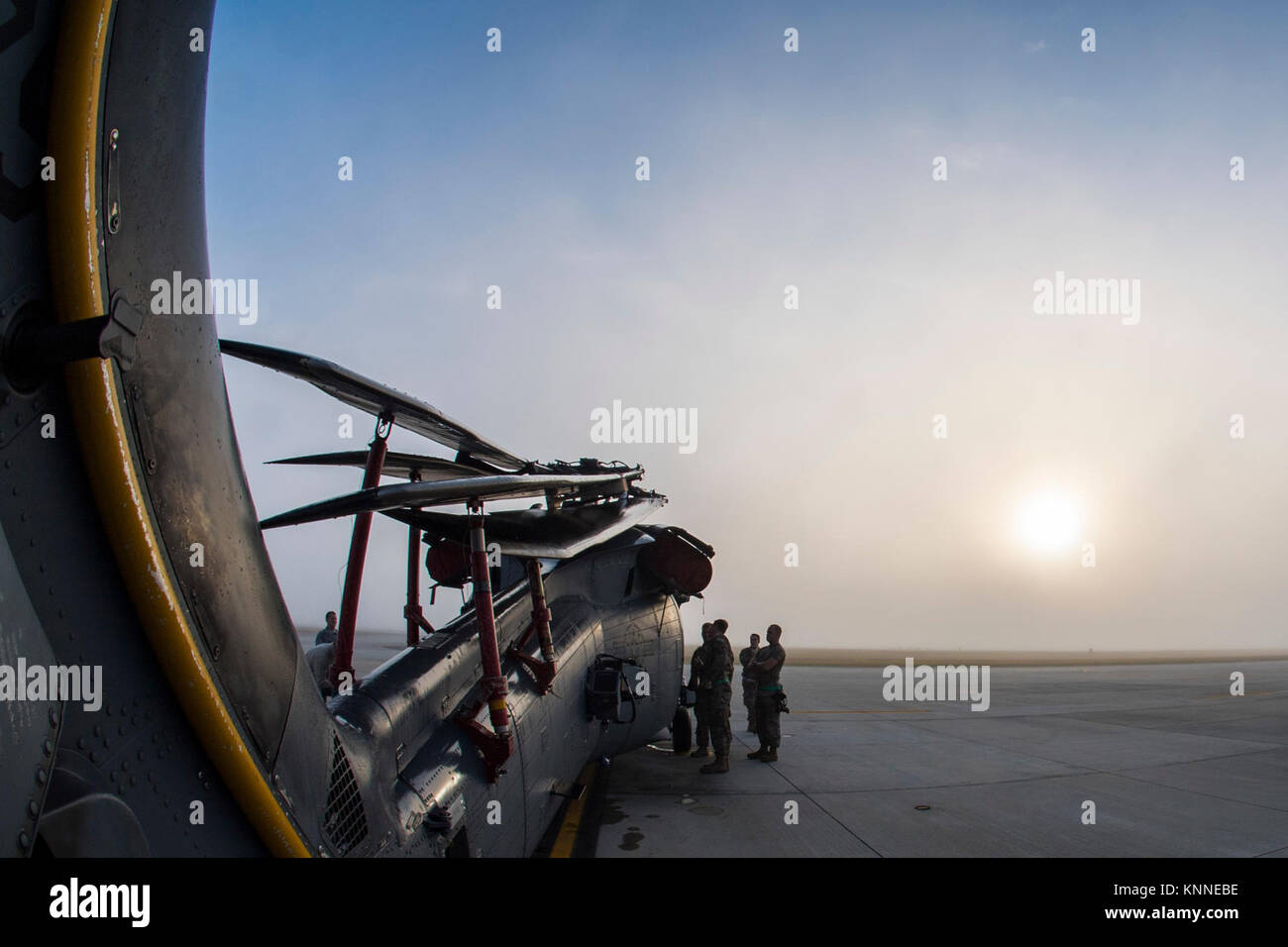 Airmen from the 723d Aircraft Maintenance Squadron begin unfolding an ...