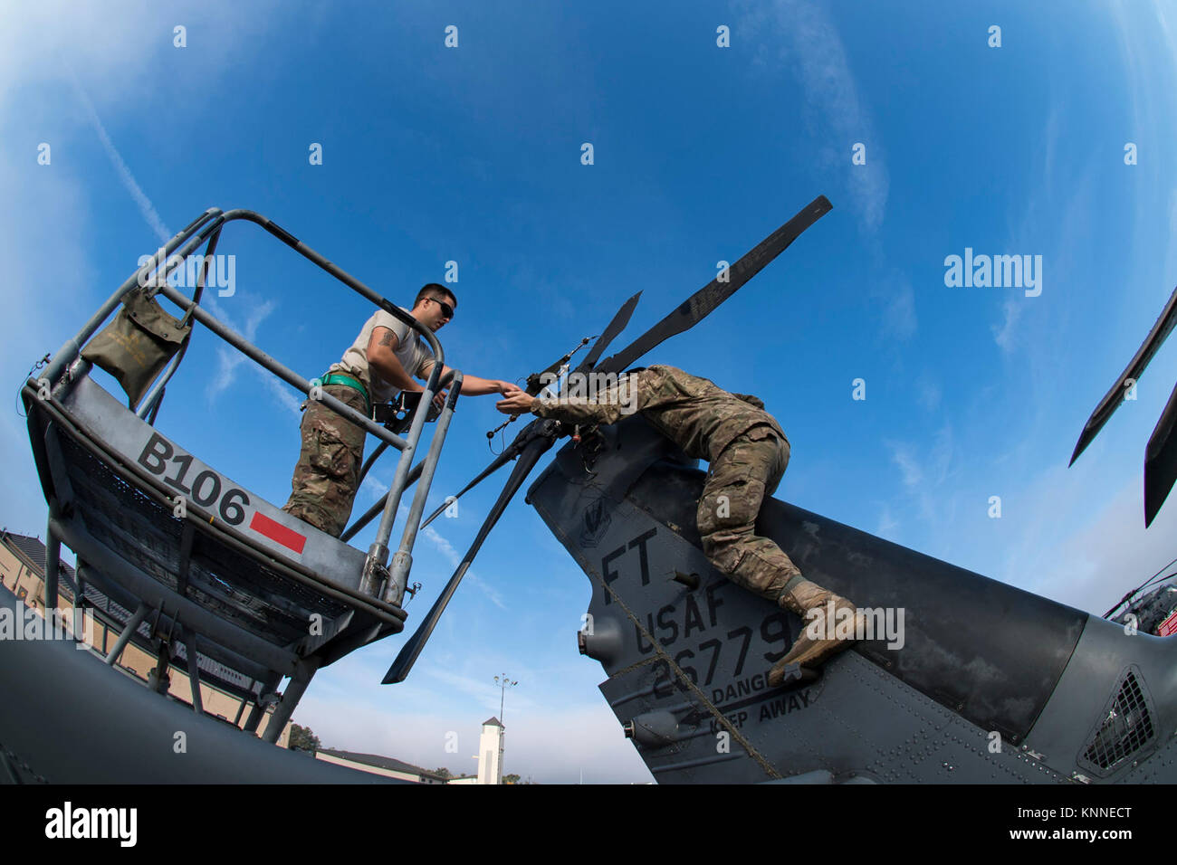Airmen from the 723d Aircraft Maintenance Squadron begin unfolding an ...