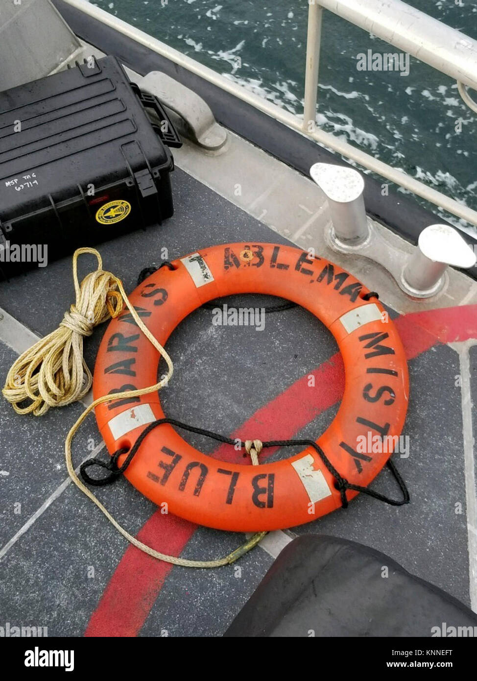 A life ring from the fishing boat Misty Blue lays on the deck of a ...
